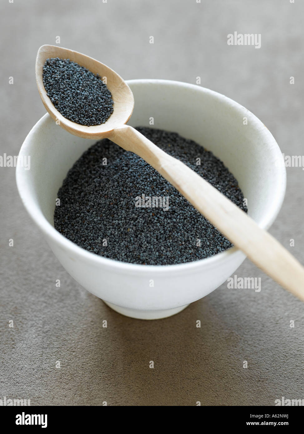 Blue poppy seeds Stock Photo - Alamy