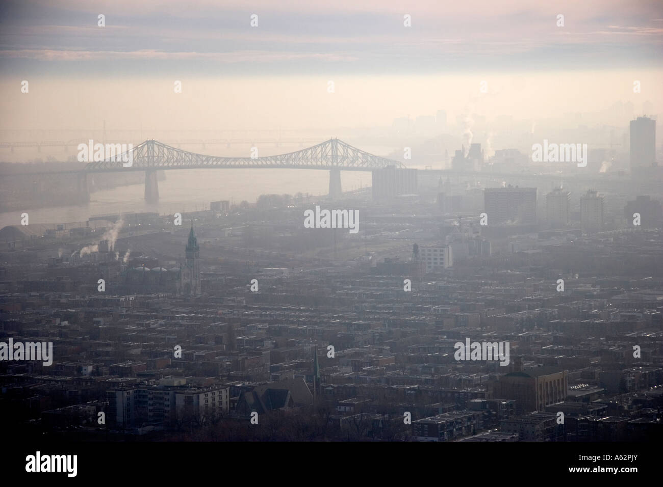 Montreal Canada industrial skyline with bridge and smog Stock Photo - Alamy