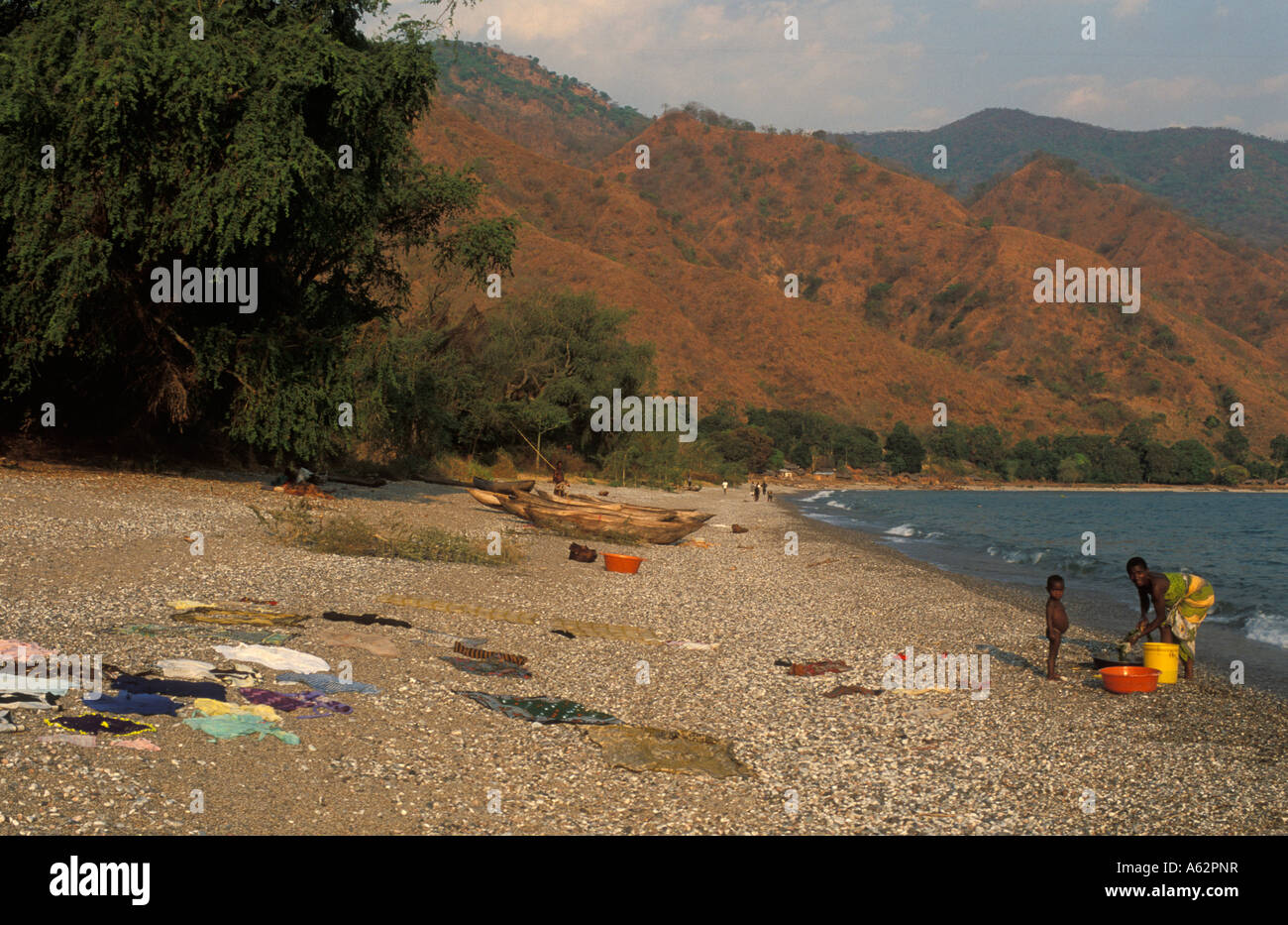 fishing village below Livingstone Mountains Lake Nyasa Matema Beach ...