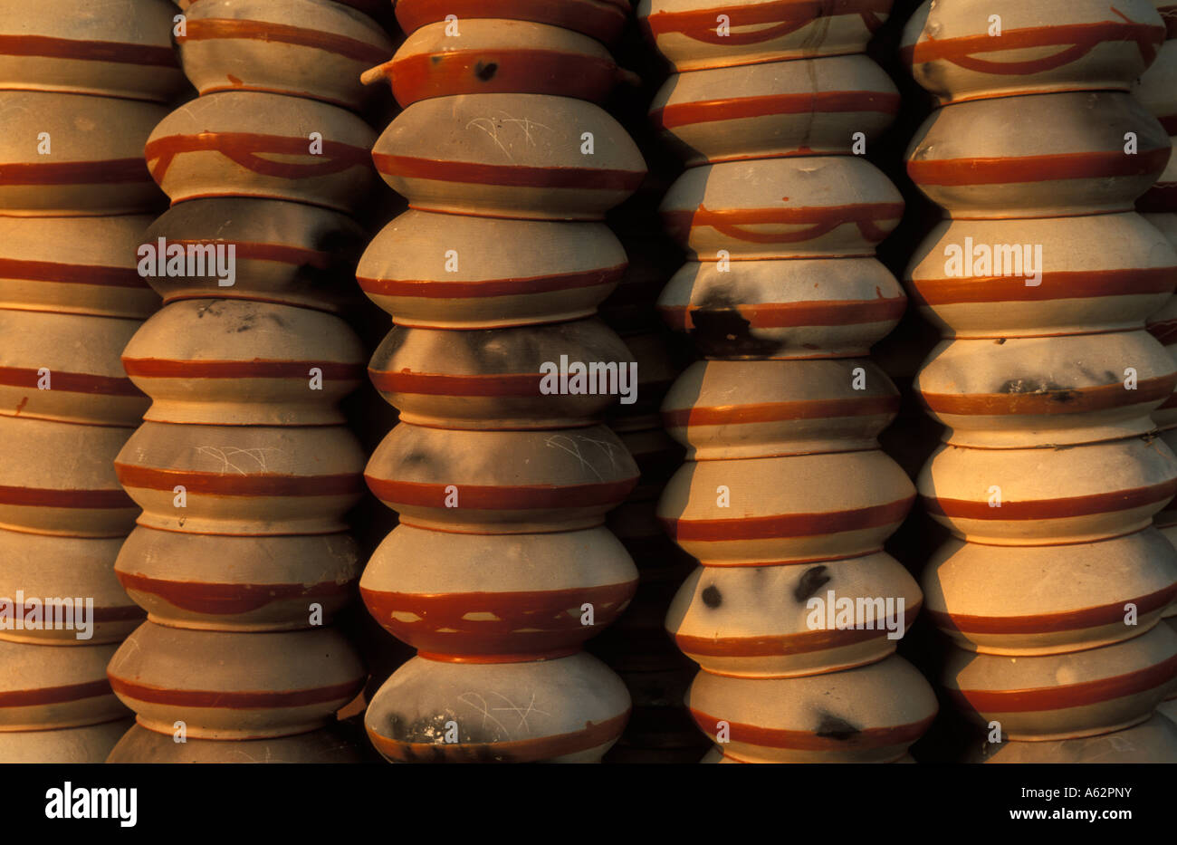 clay pots crafted by the Kisi people Matema pottery market Matema beach ...