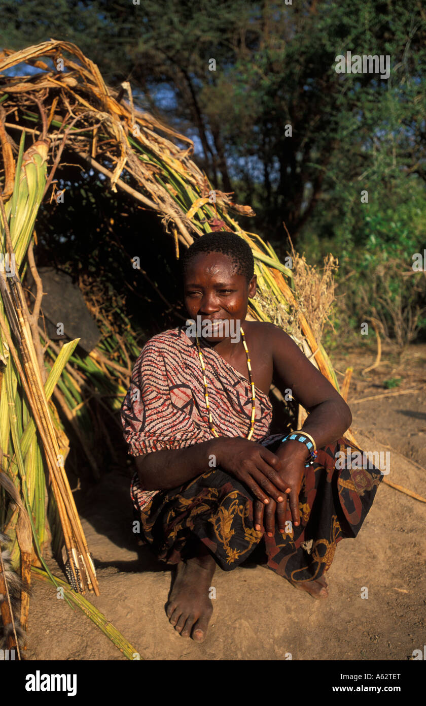 Hadza woman in her hut Lake Eyasi Tanzania Small tribe of hunter ...