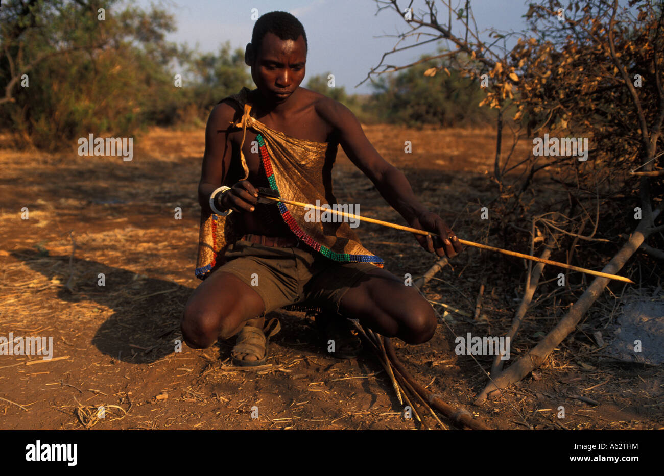 Hadzabe man hunting with bow and arrow hi-res stock photography and ...