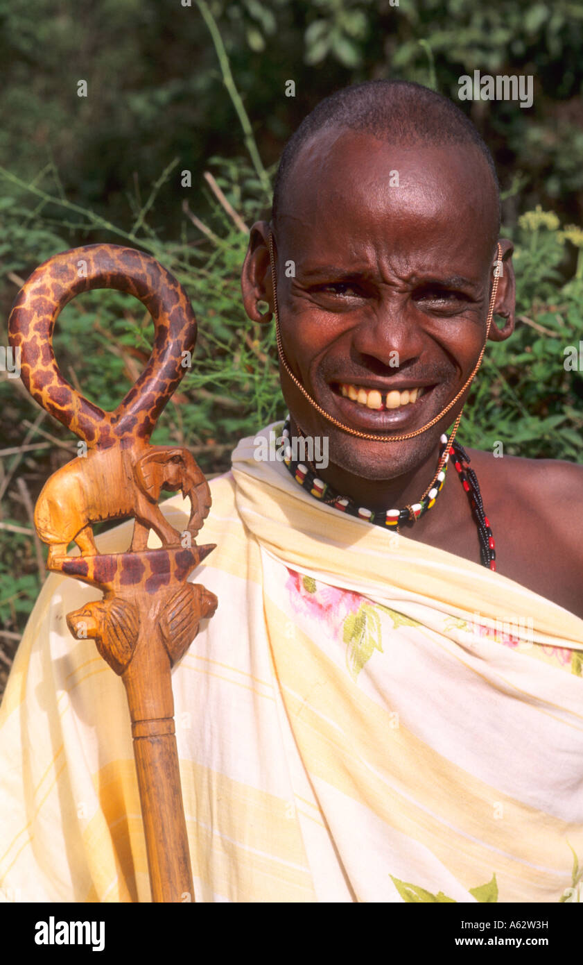 Maasai tribe man with large ear hole for jewelry in costume traditional ...