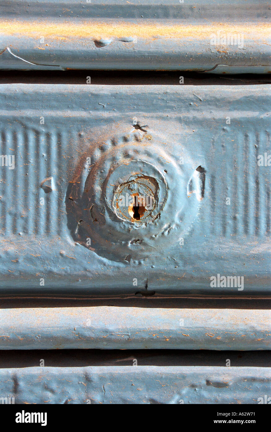 light blue painted over key hole Stock Photo - Alamy