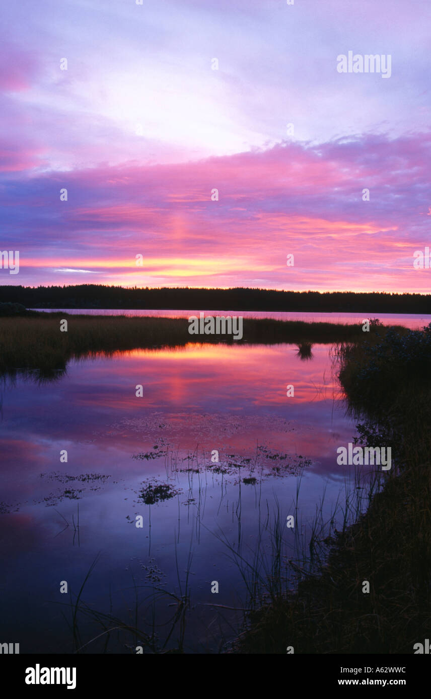 Dusky sky reflected in river water, Dal River, Dalarna, Sweden Stock ...