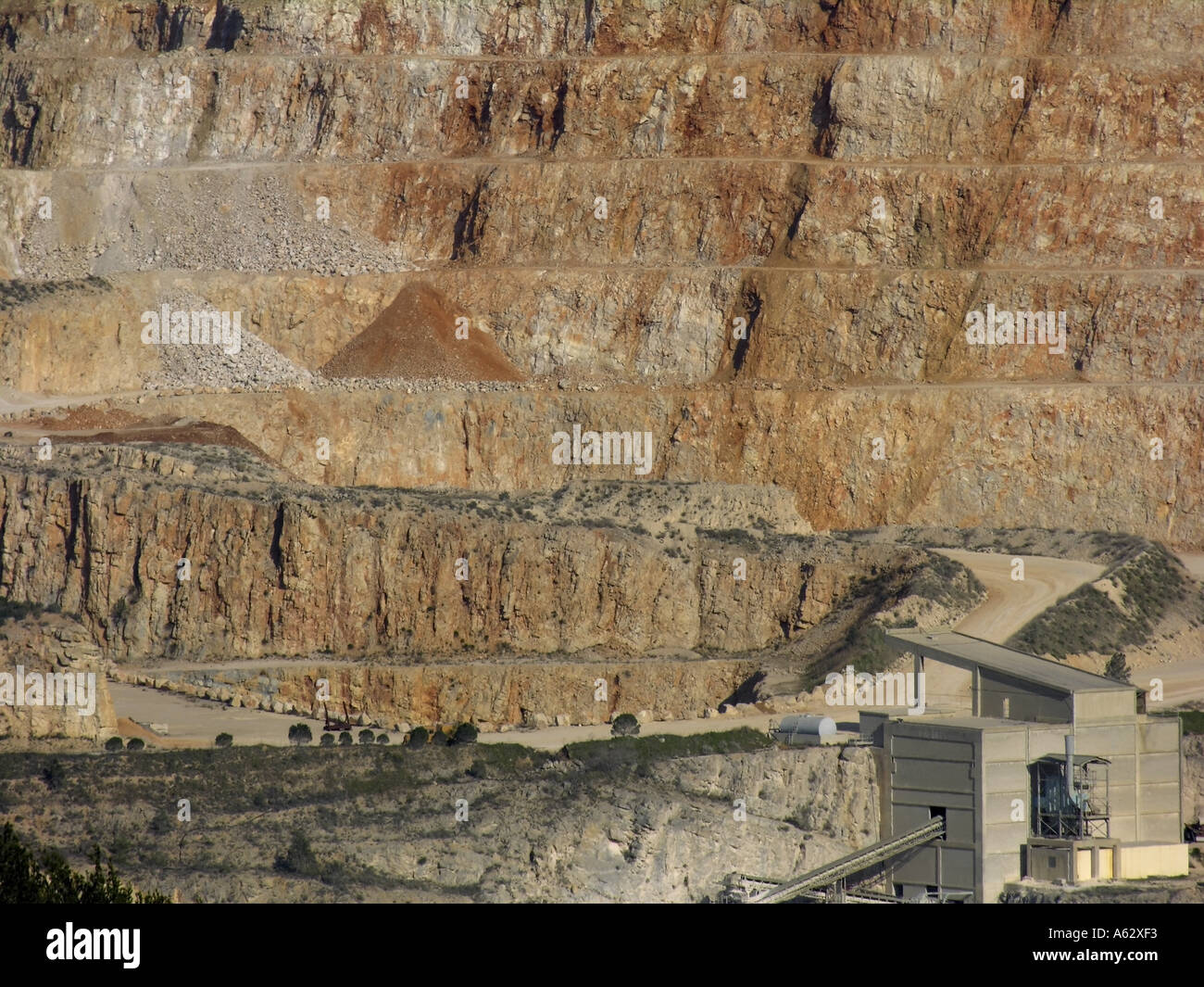 Rock formations created by a stone quarry Stock Photo - Alamy