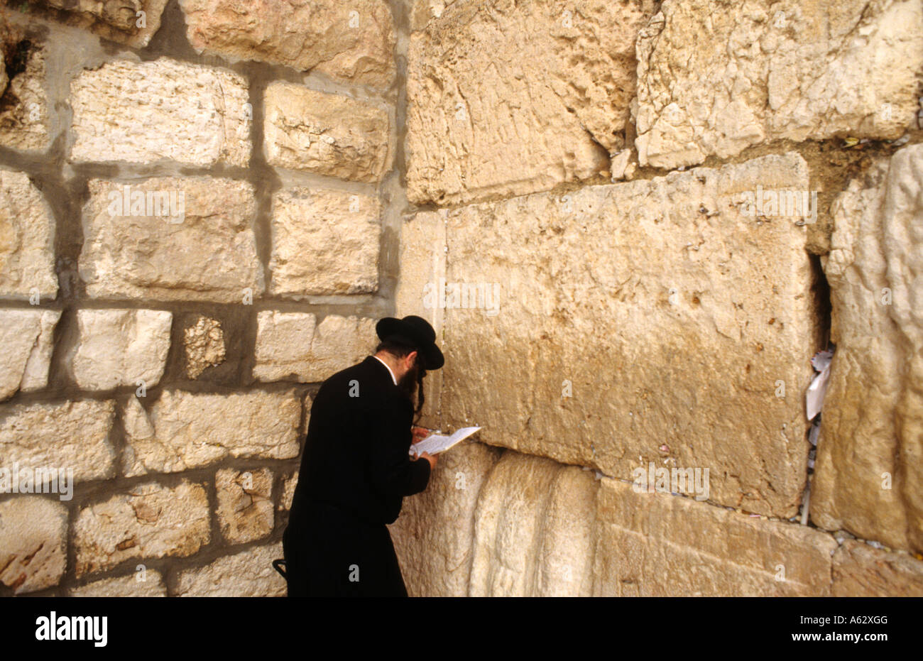 Religious worshipers practicing their religion and chanting and reading ...