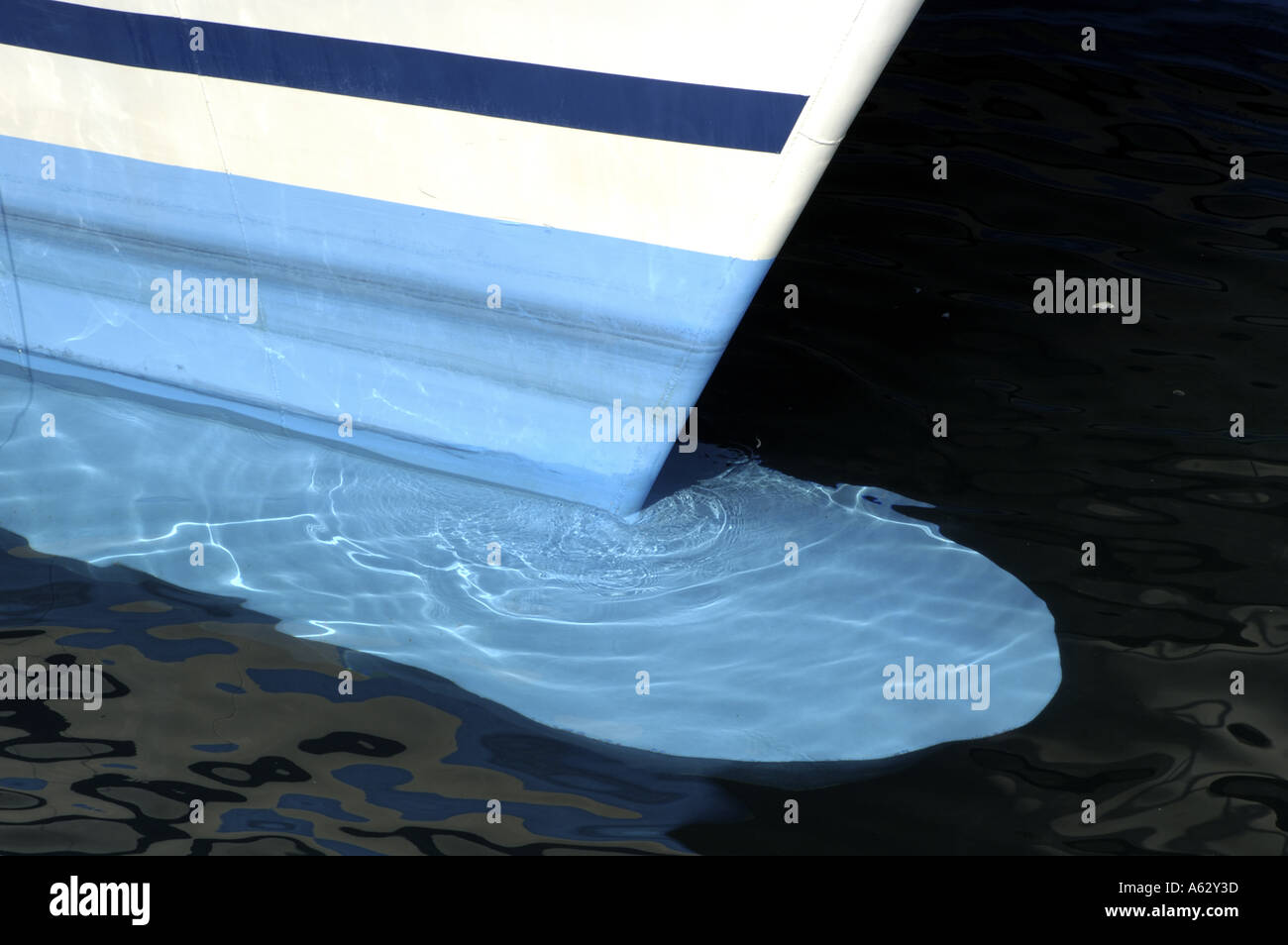 Prow in the water of a catamaran boat Stock Photo - Alamy