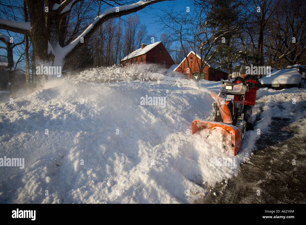 Young Boy Digging out from Snow Storm - Ithaca NY - Using snow blower ...
