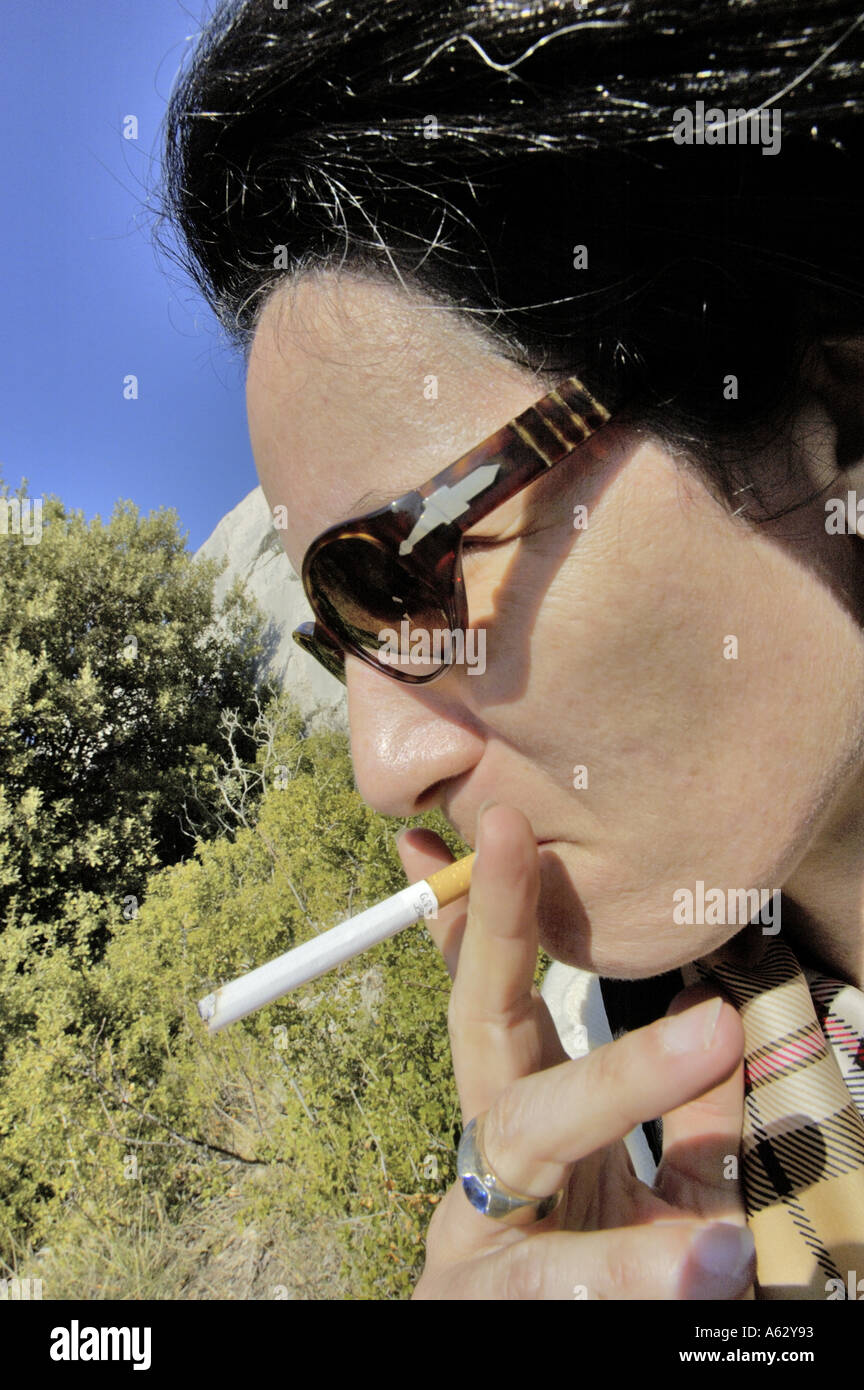 French woman smoking cigarette hi-res stock photography and images - Alamy