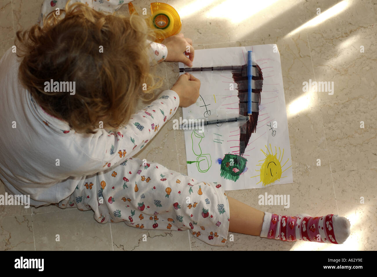 Four years old girl drawings Stock Photo - Alamy