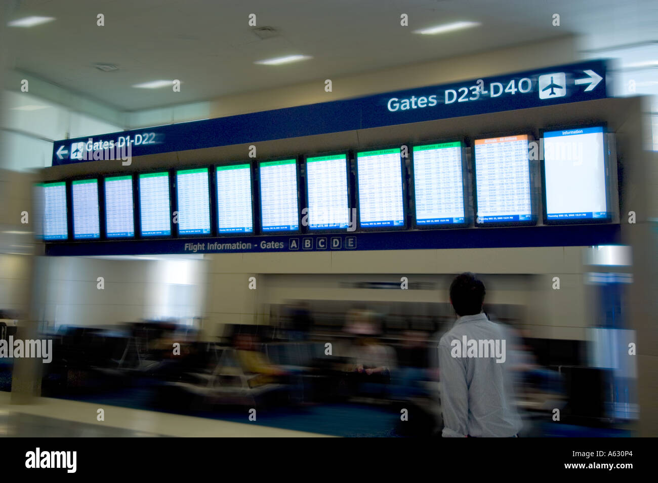 Airport flight information screens Stock Photo - Alamy