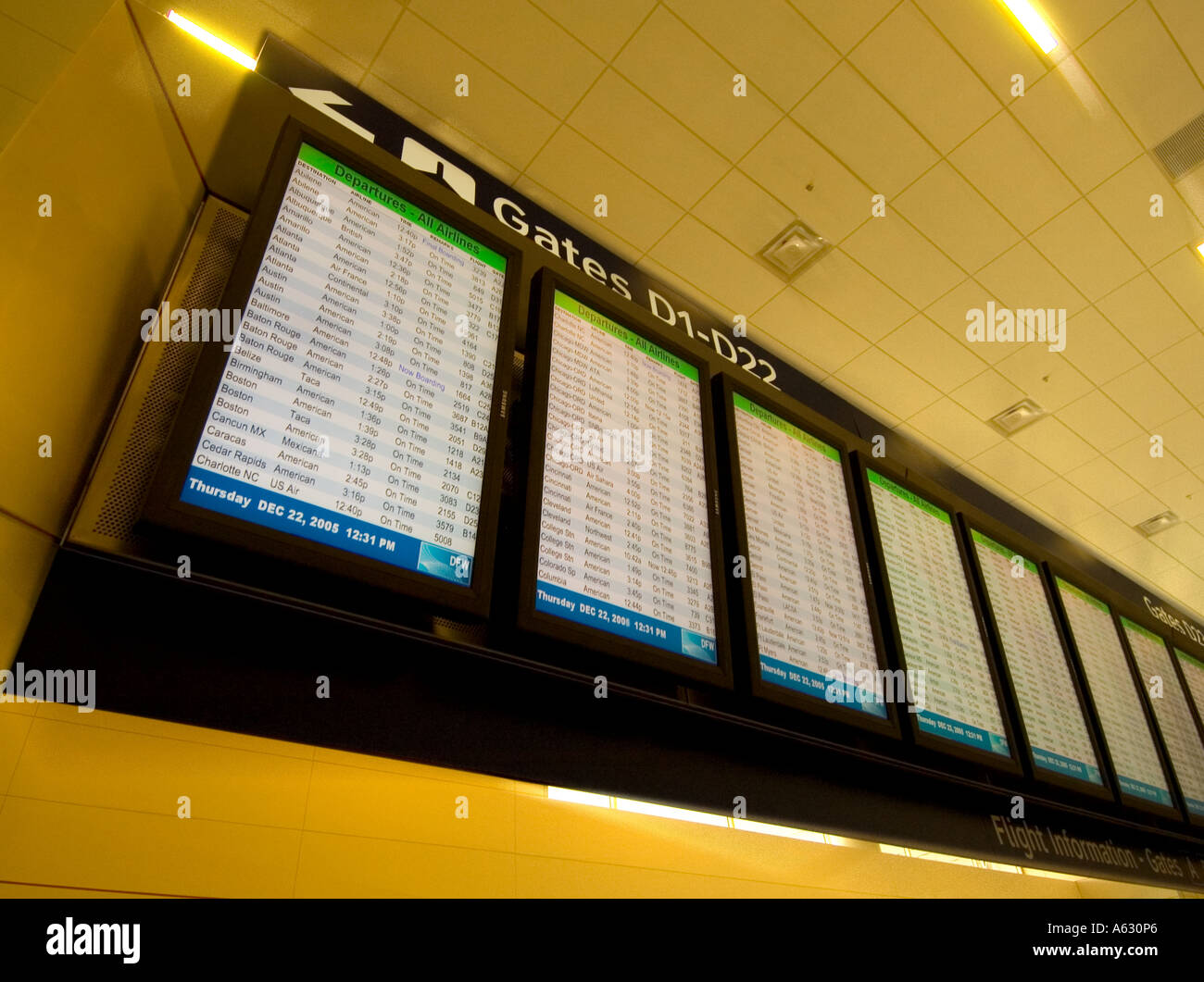 Airport flight information screens Stock Photo - Alamy