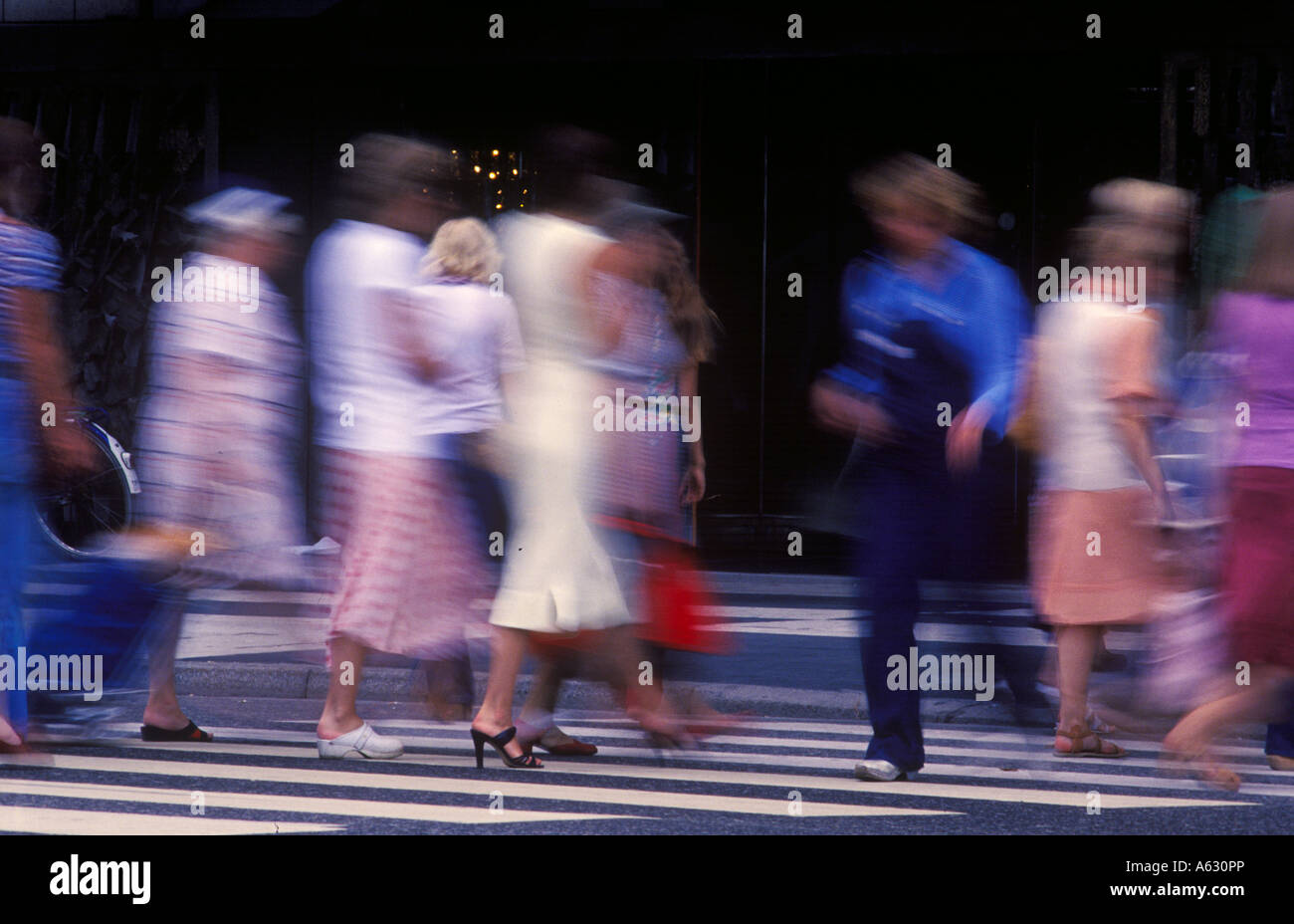 pedestrian hurrying over a crossing Stock Photo - Alamy