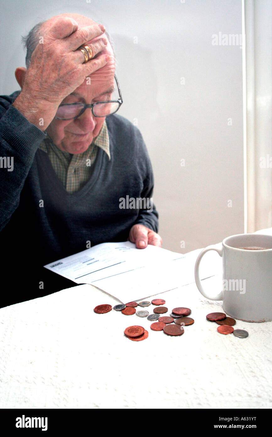 old man paying bills Stock Photo - Alamy