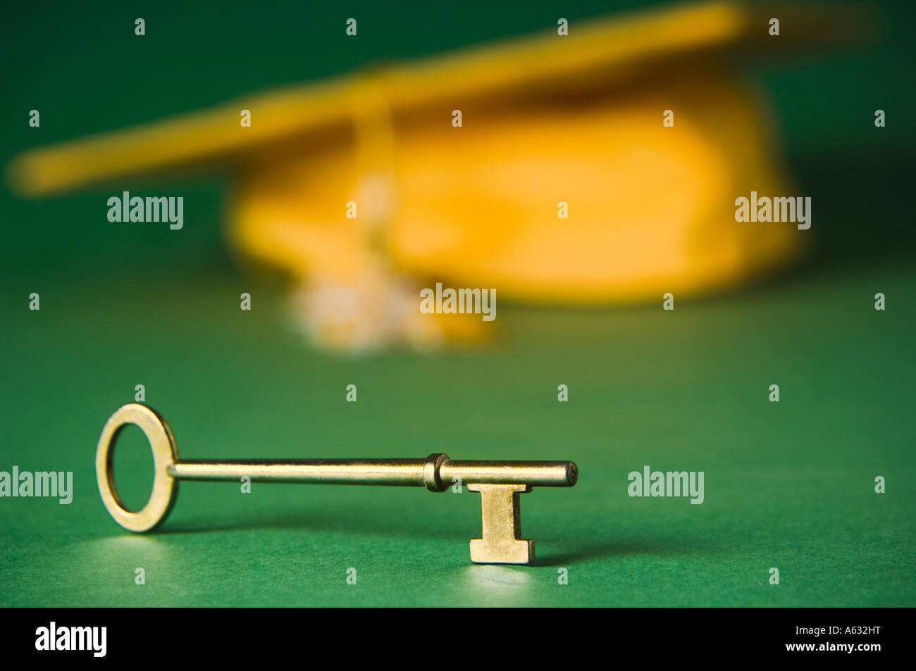 Graduation cap and key Stock Photo - Alamy