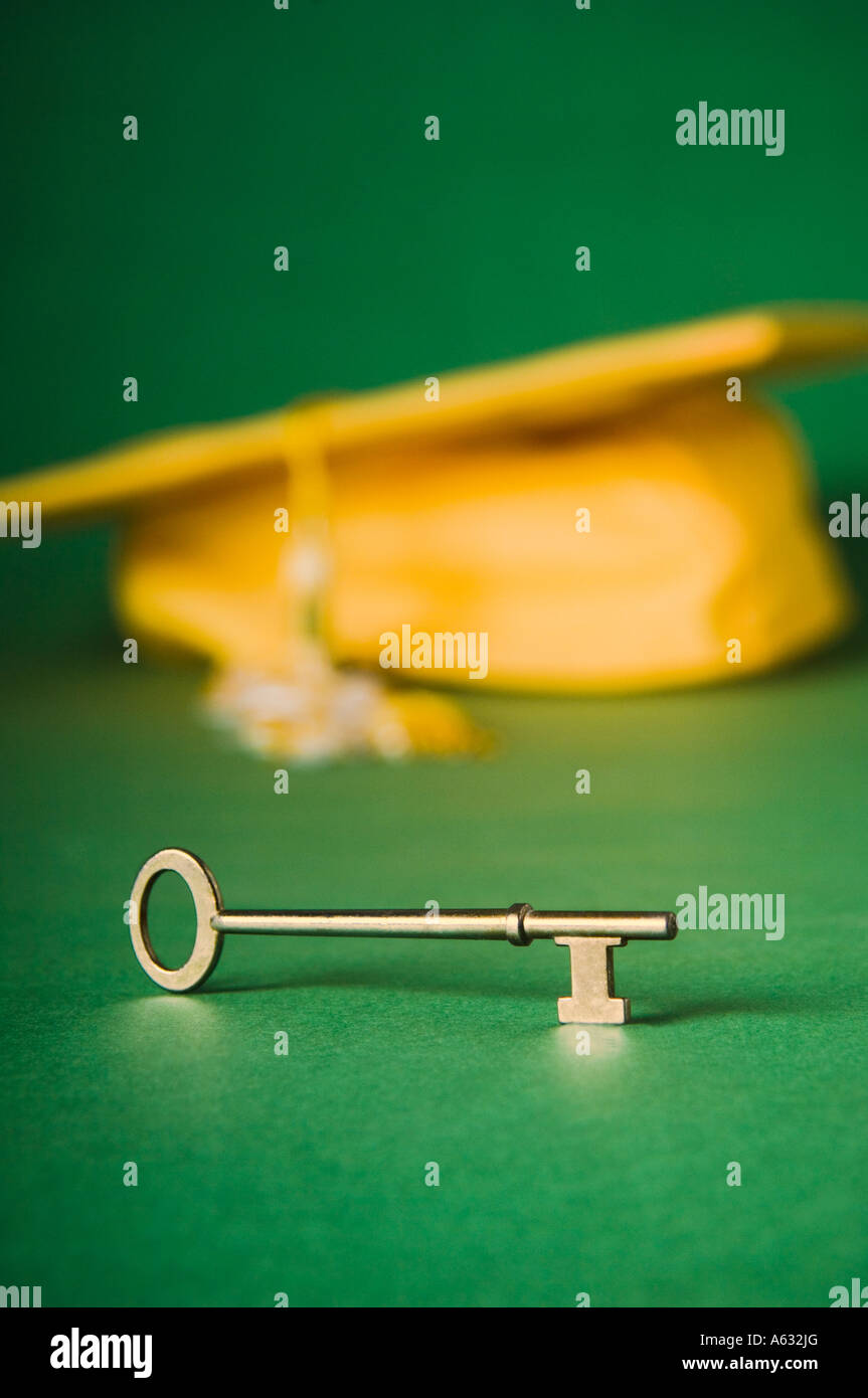 Graduation cap and key Stock Photo - Alamy