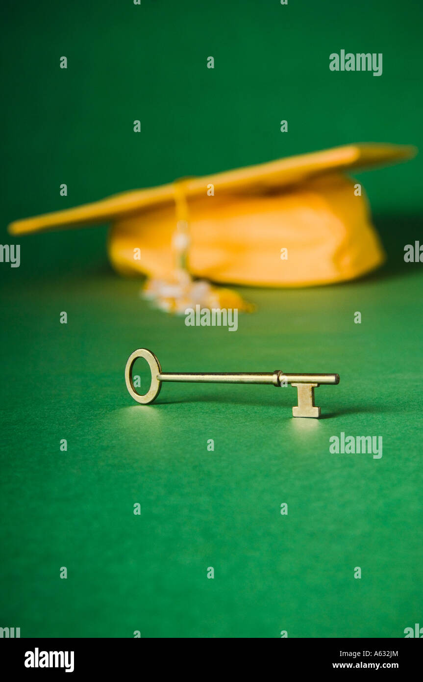 Graduation cap and key Stock Photo - Alamy
