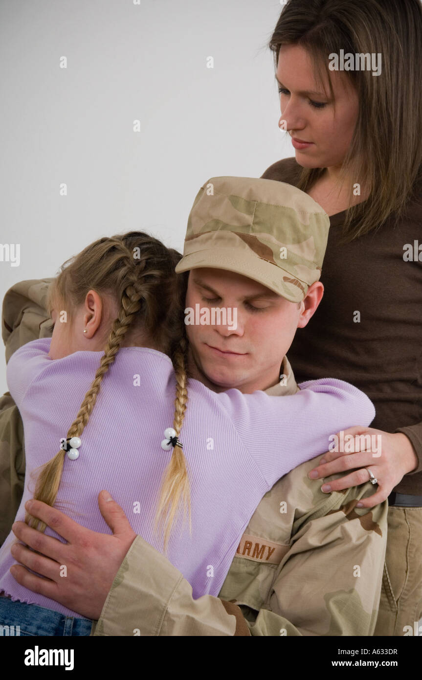 Military father saying goodbye Stock Photo - Alamy