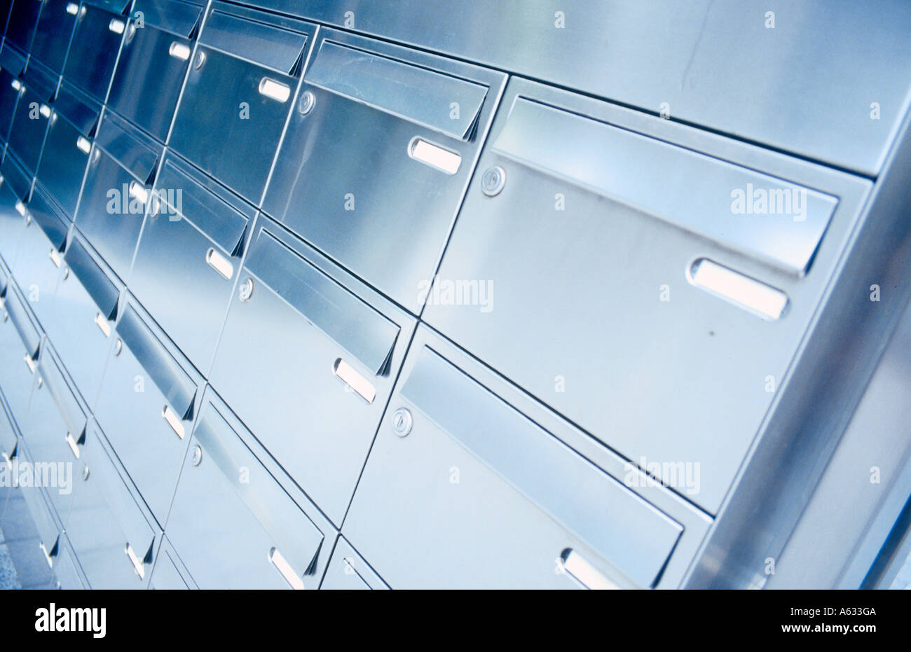 Side profile of mailboxes in rows Stock Photo - Alamy