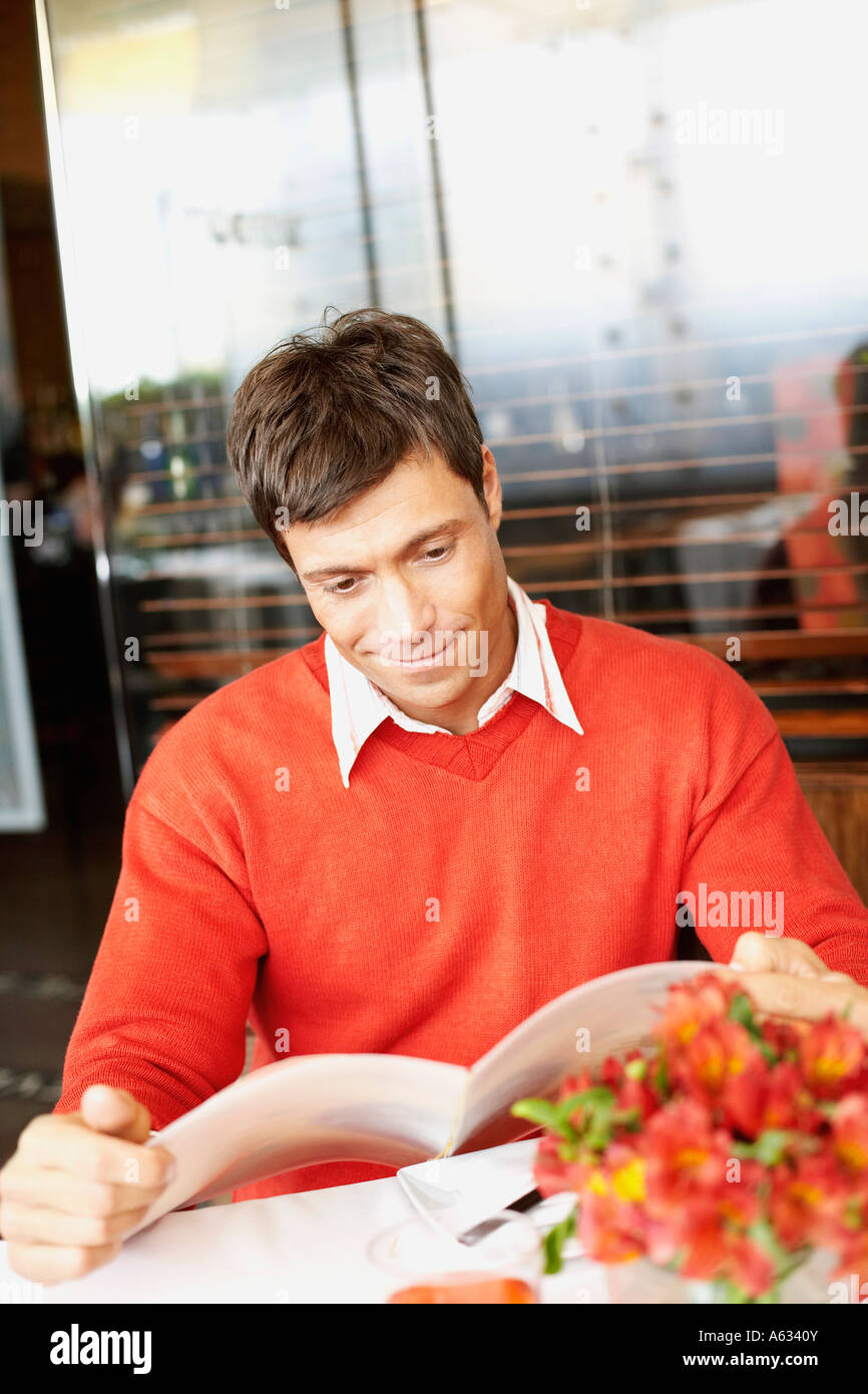 Man looking menu in fine hi-res stock photography and images - Alamy