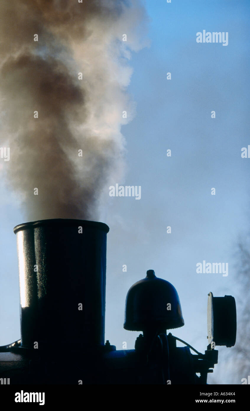 Steam engine emitting smoke Stock Photo - Alamy