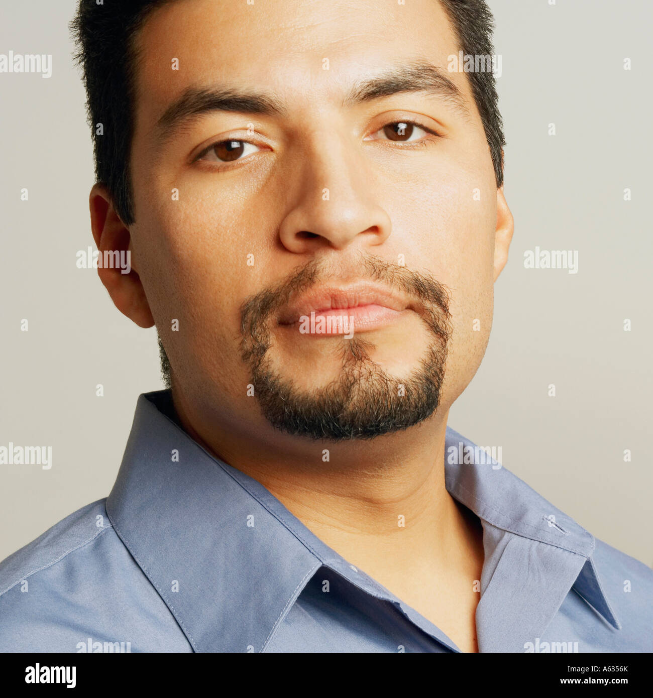 Portrait of a mid adult man looking serious Stock Photo - Alamy