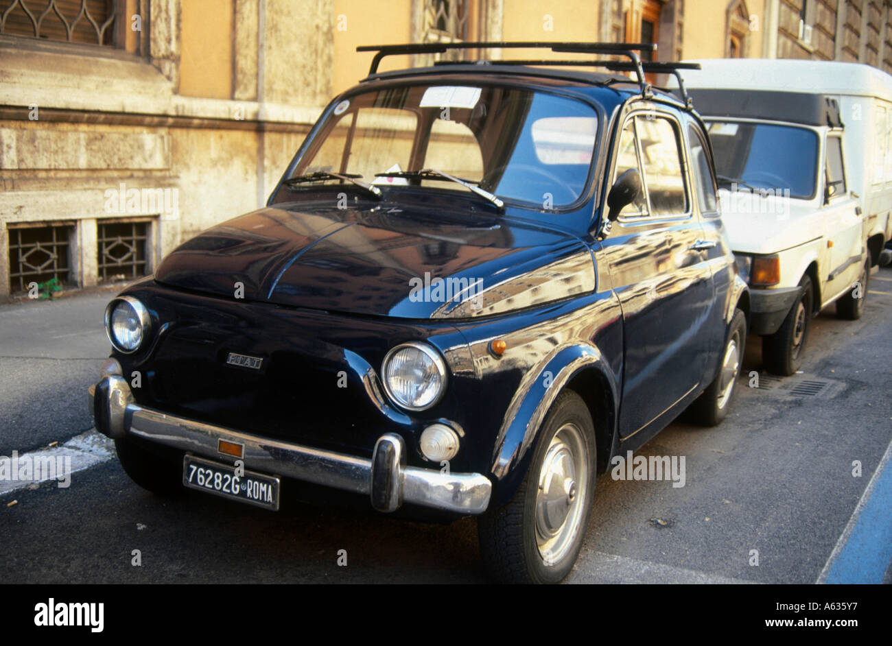 Cars parked at parking lot, Rome, Italy Stock Photo - Alamy