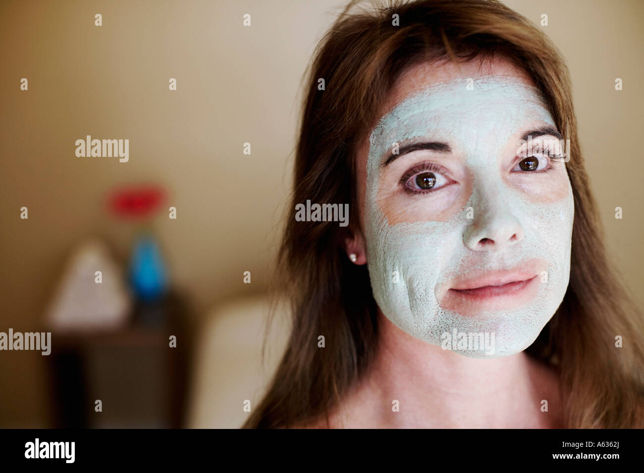 Portrait of a mid adult woman having a facial Stock Photo - Alamy