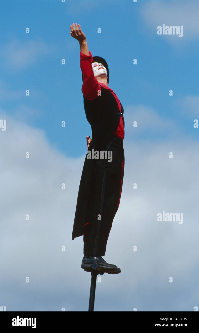 Clowns on the end of a pole Stock Photo - Alamy