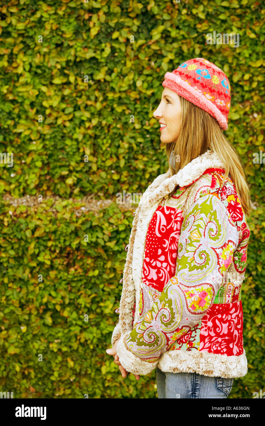 Side profile of a young woman smiling Stock Photo - Alamy