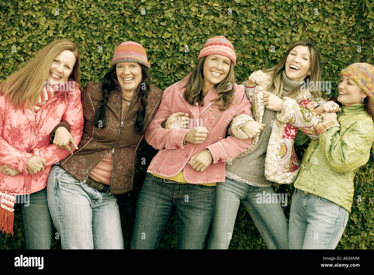 Portrait of five young women smiling Stock Photo - Alamy