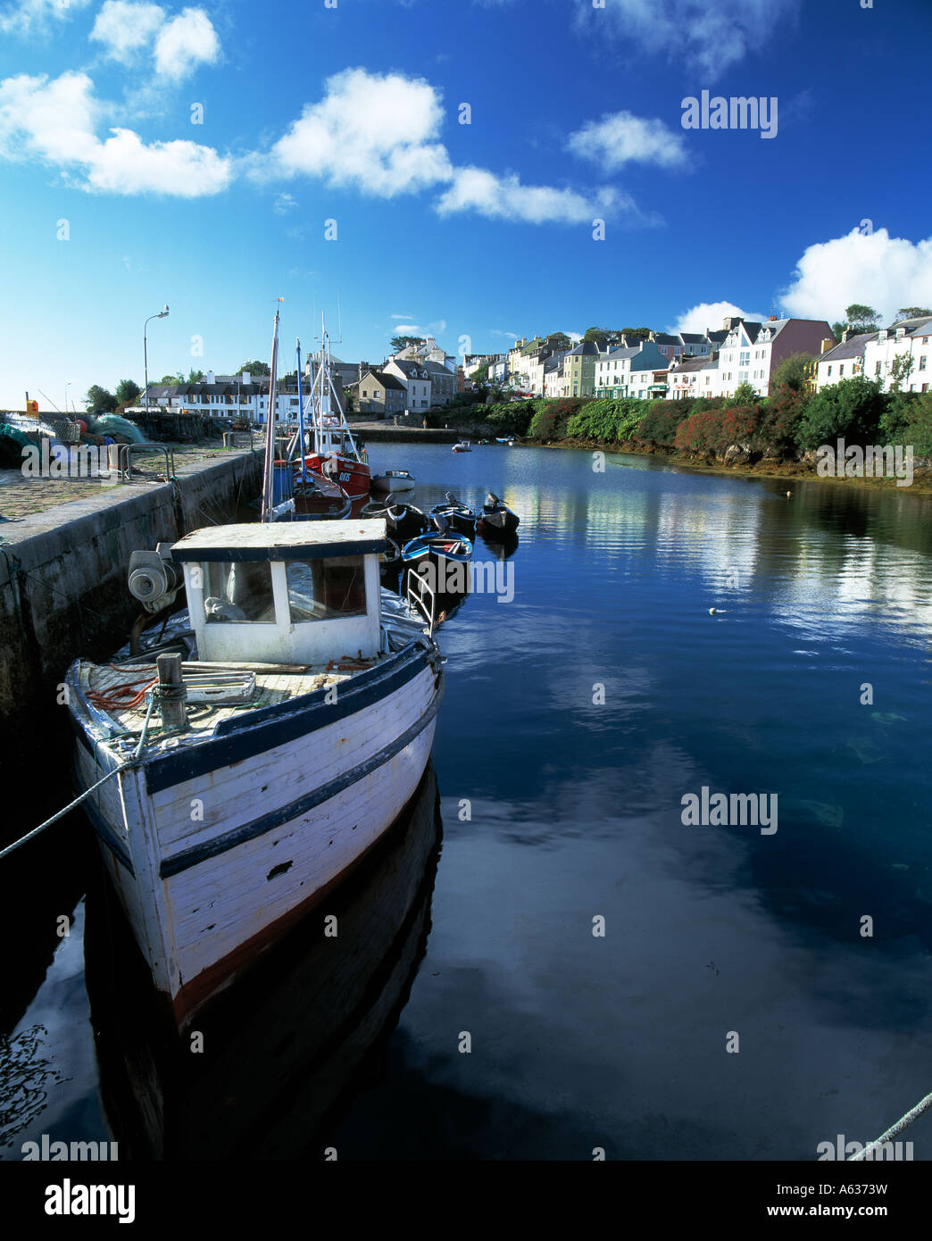 roundstone harbor village, county galway, ireland, fishing boats tied ...