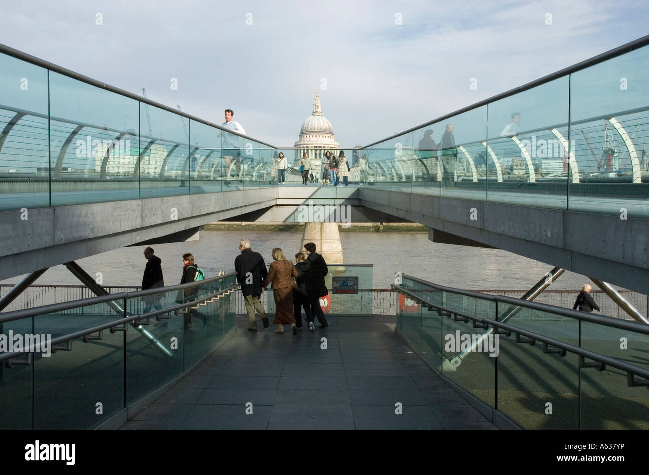 People crossing the Millenium Bridge London Stock Photo - Alamy