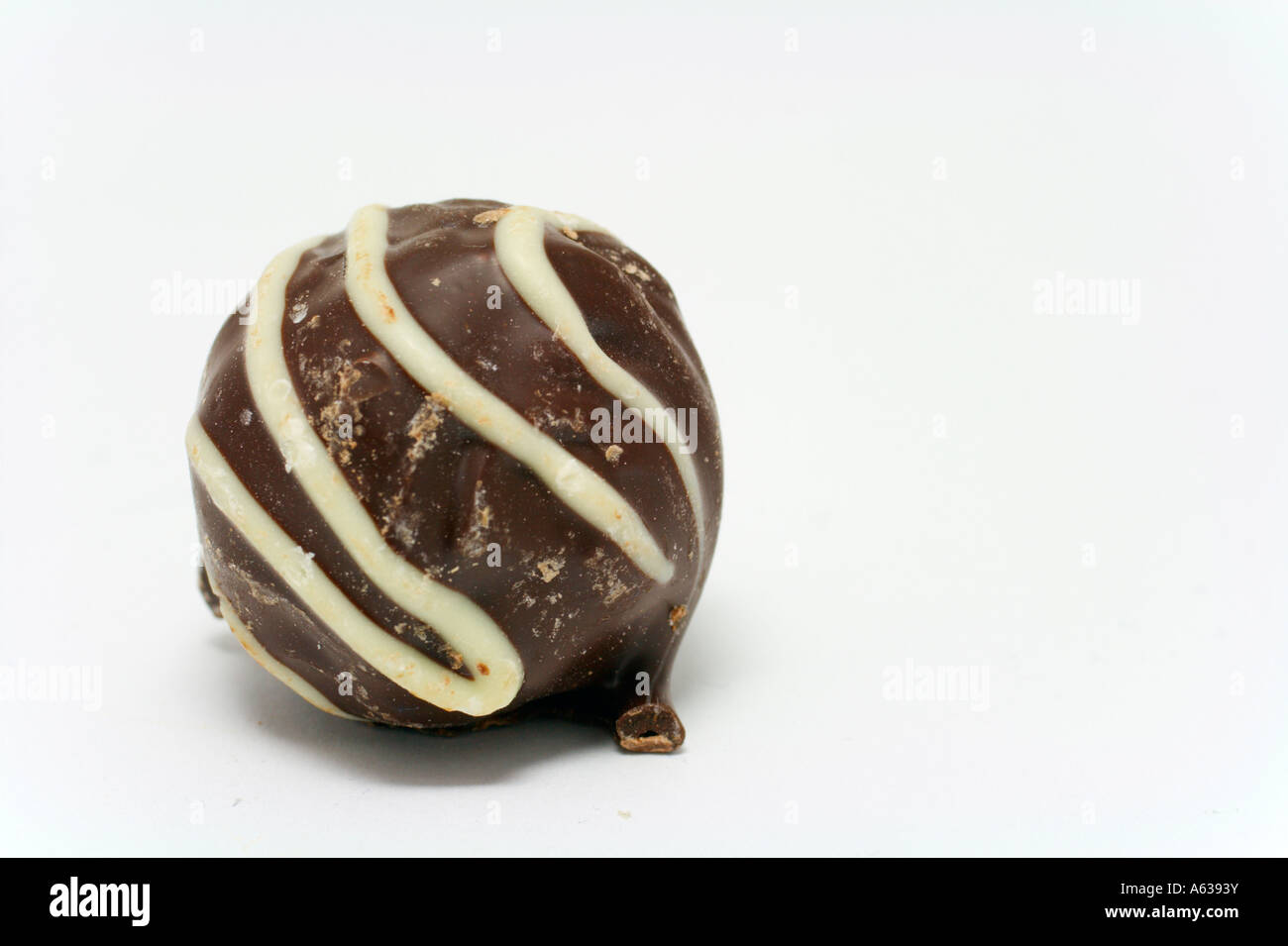 A single chocolate truffle Stock Photo - Alamy