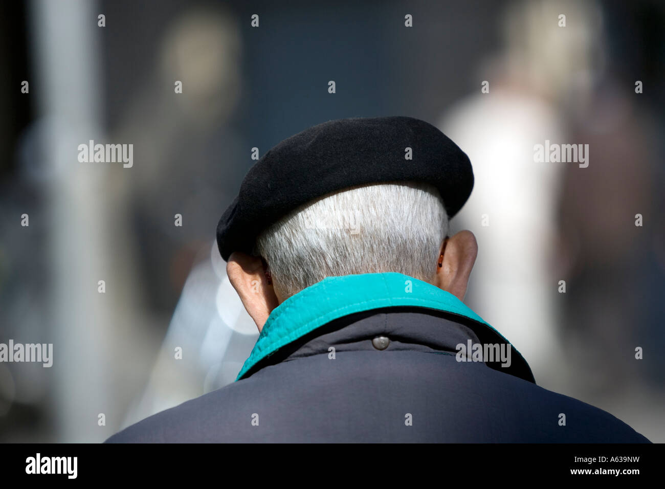Rear view of old man wearing black beret, La Rambla, Barcelona ...
