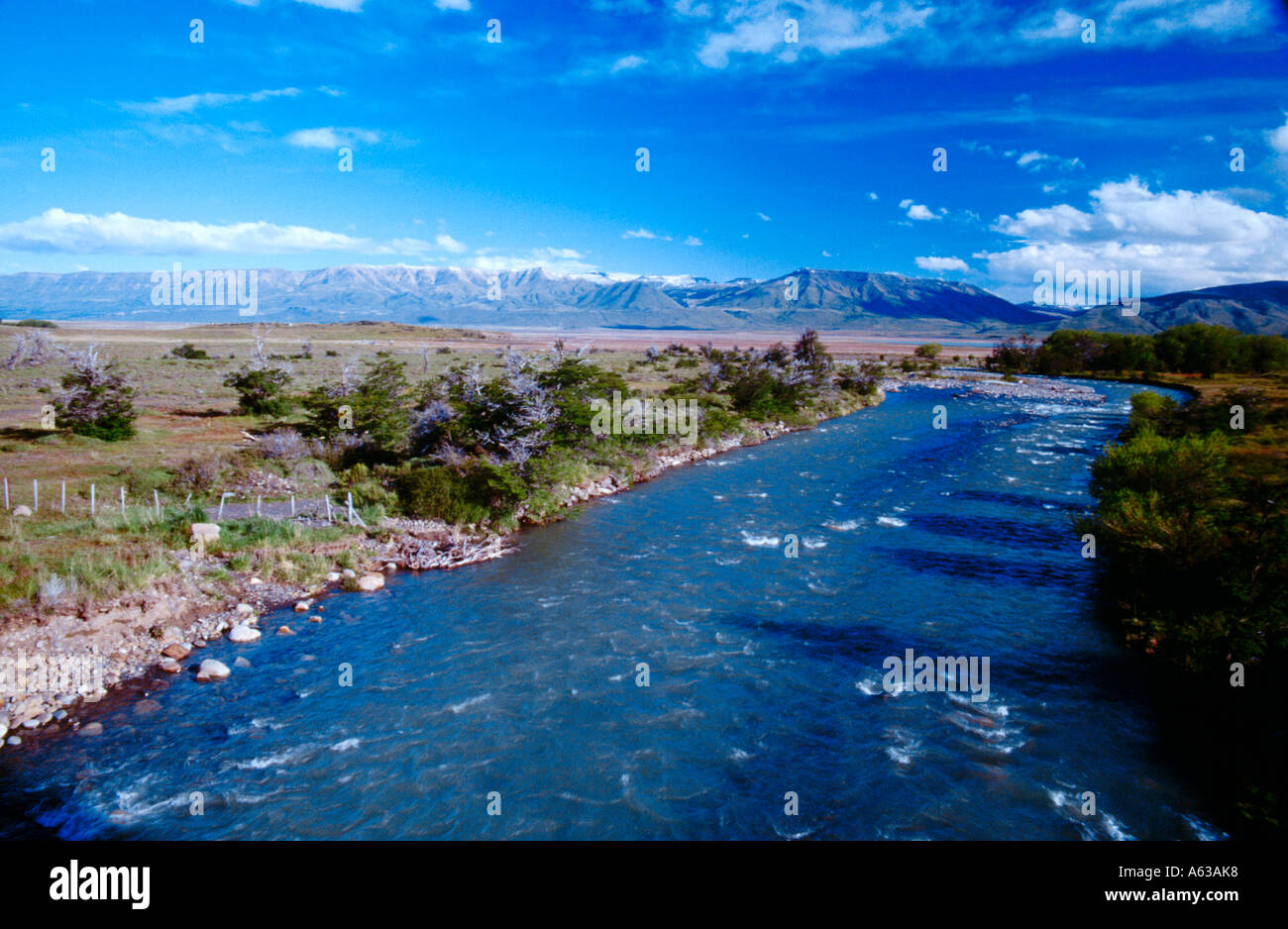 River flowing through landscape Stock Photo - Alamy