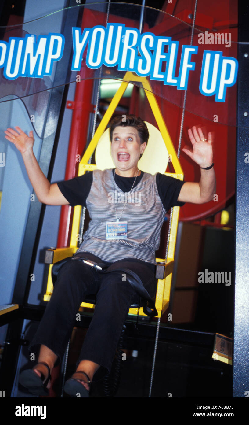 Young woman in a Pump Yourself Up chair at the Science Port Sci Port ...