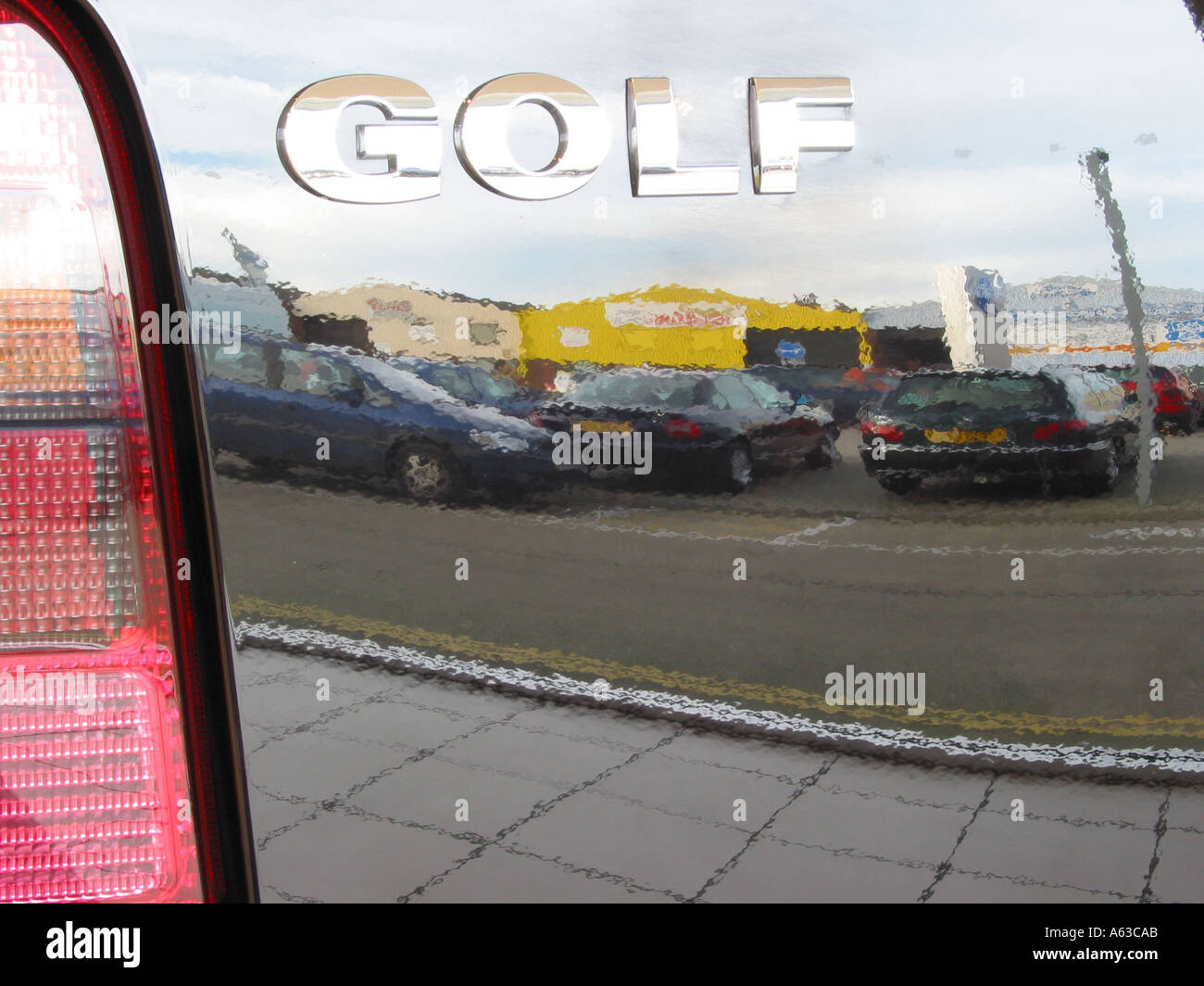 New and Used Car Sales Reflection in Forecourt Stock Photo - Alamy