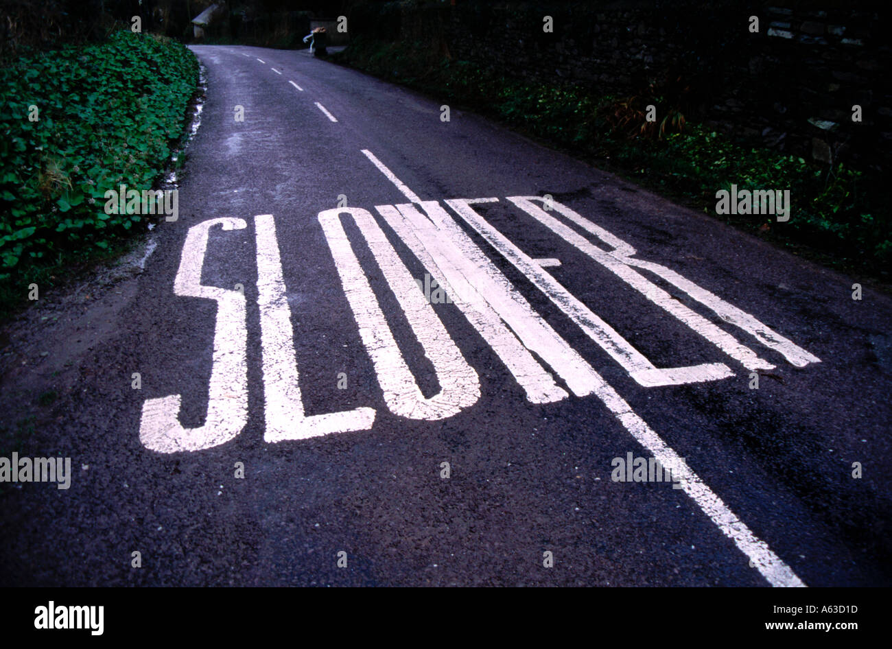 Slower Road Sign Stock Photo - Alamy