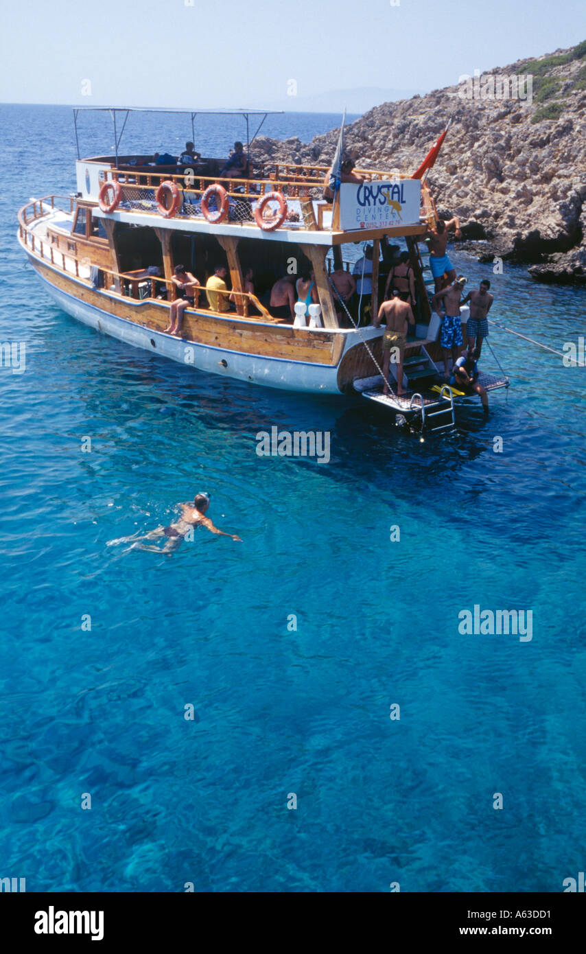 Typical Turkish wooden dive boat filled with tourist divers Bodrum ...