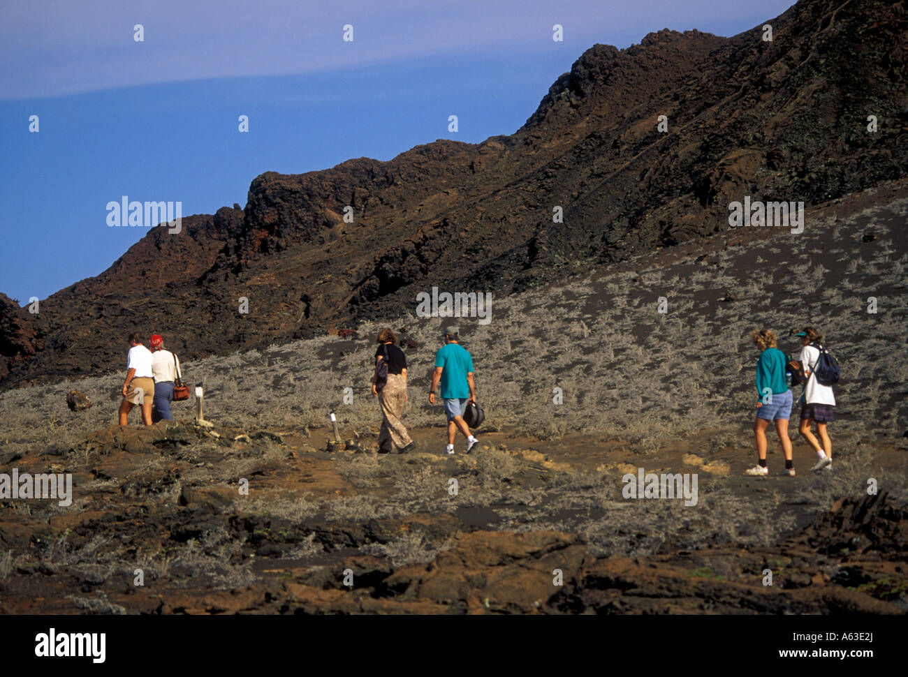 tourists, guided tour, volcanic cone, Bartolome Island, Galapagos ...
