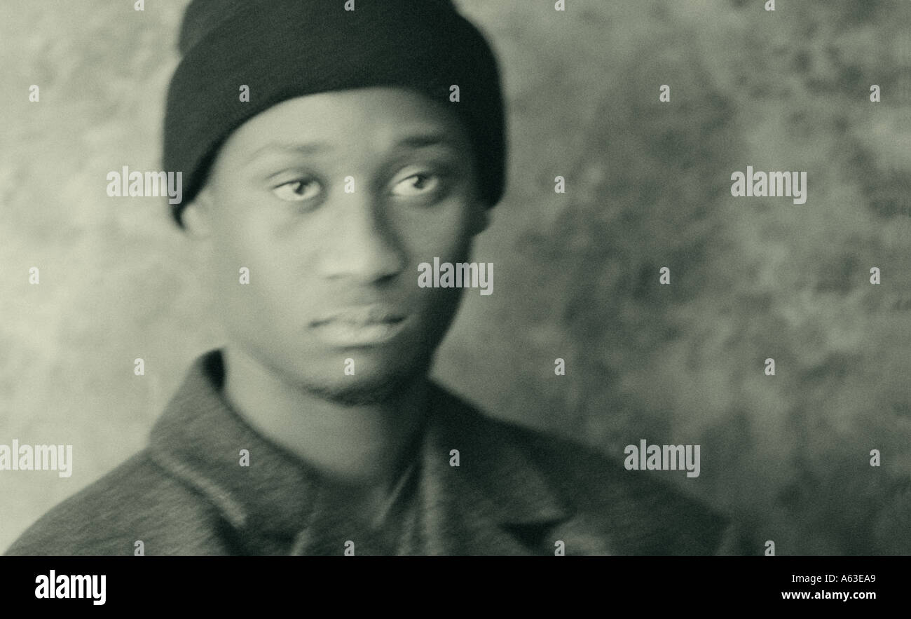black and white portrait of colored young man Stock Photo - Alamy