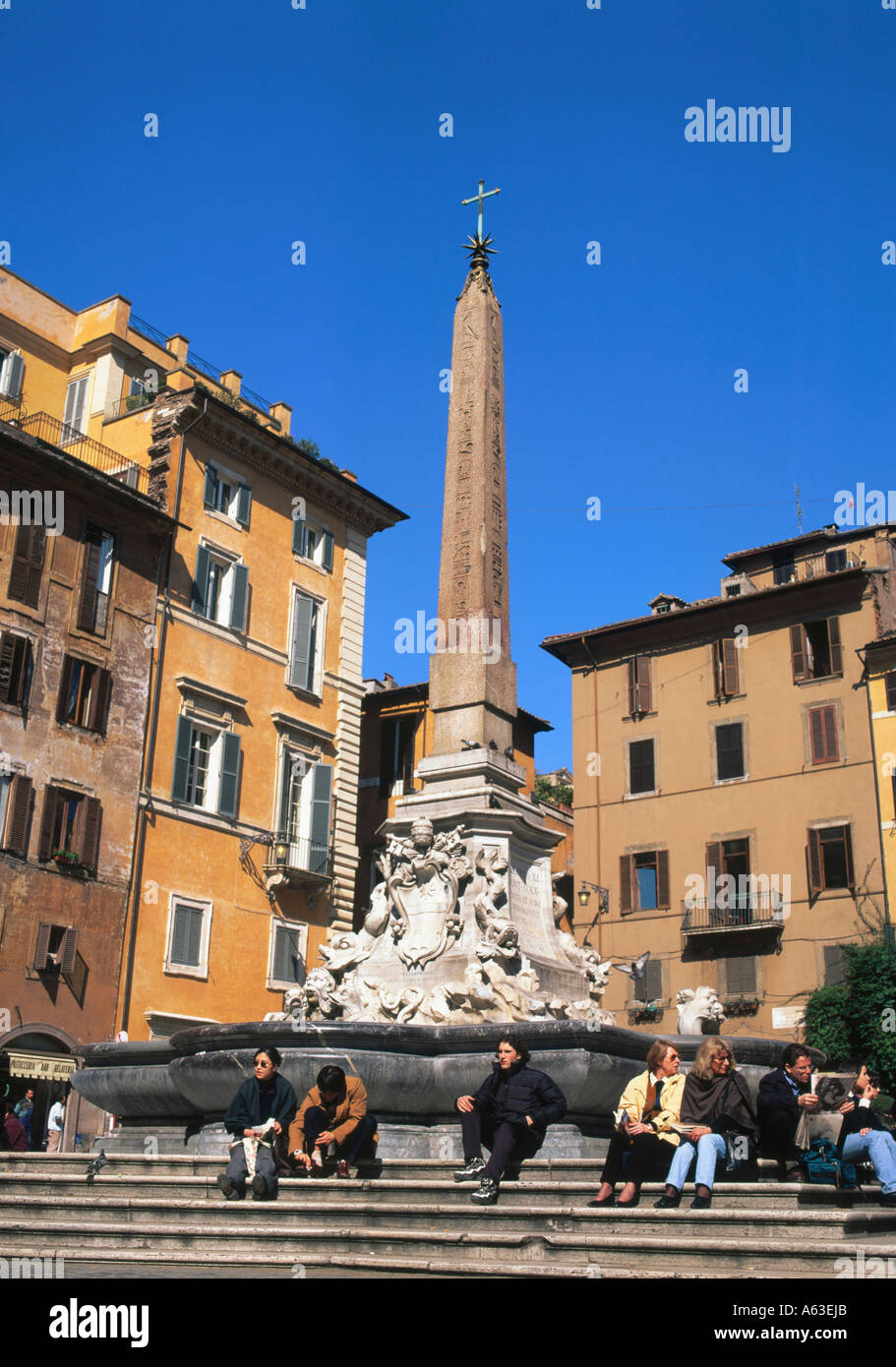 Tourists sitting on steps at fountain, Pantheon, Rome, Italy Stock ...