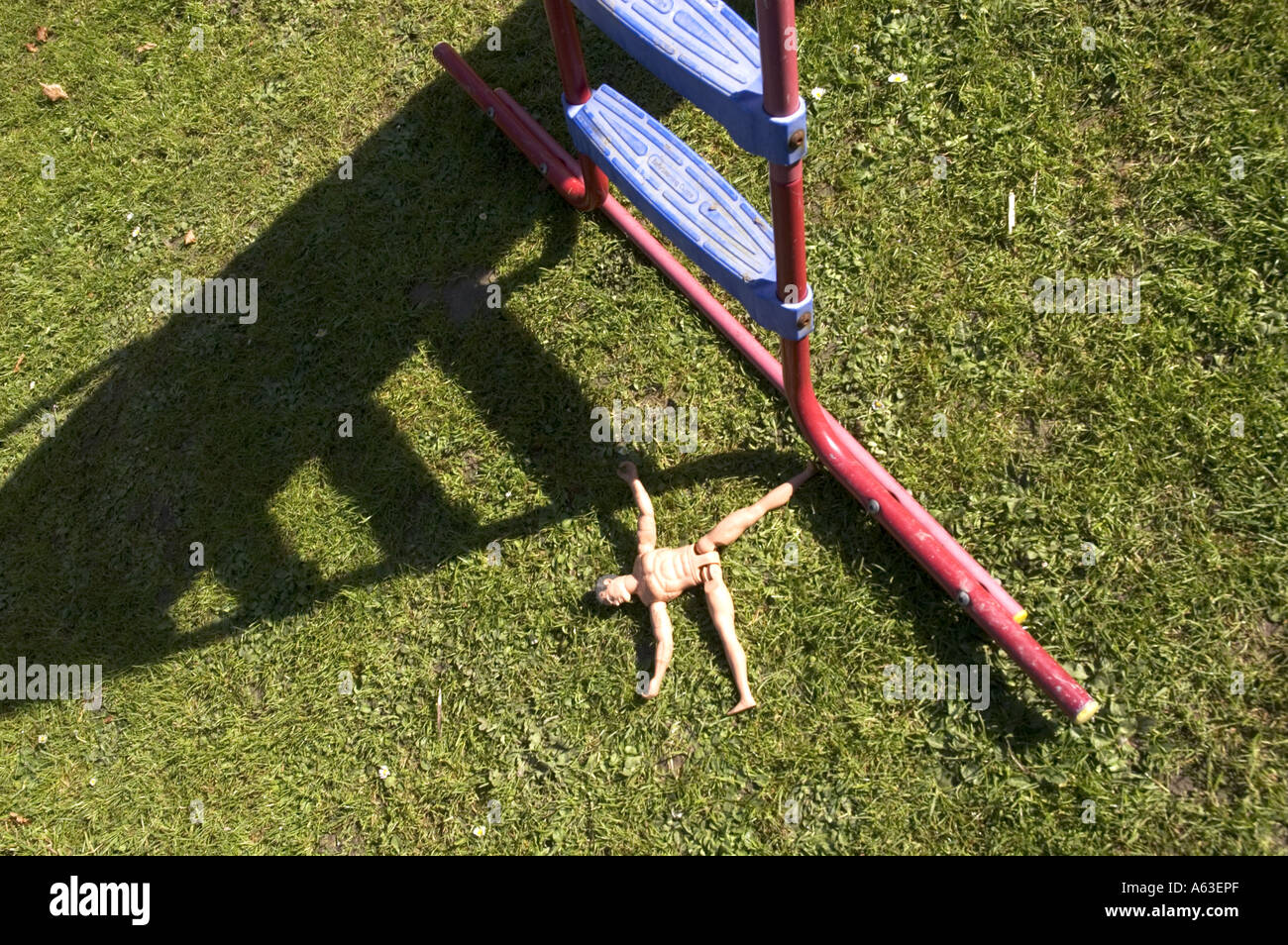 Action man toy just fallen off the slide Stock Photo - Alamy