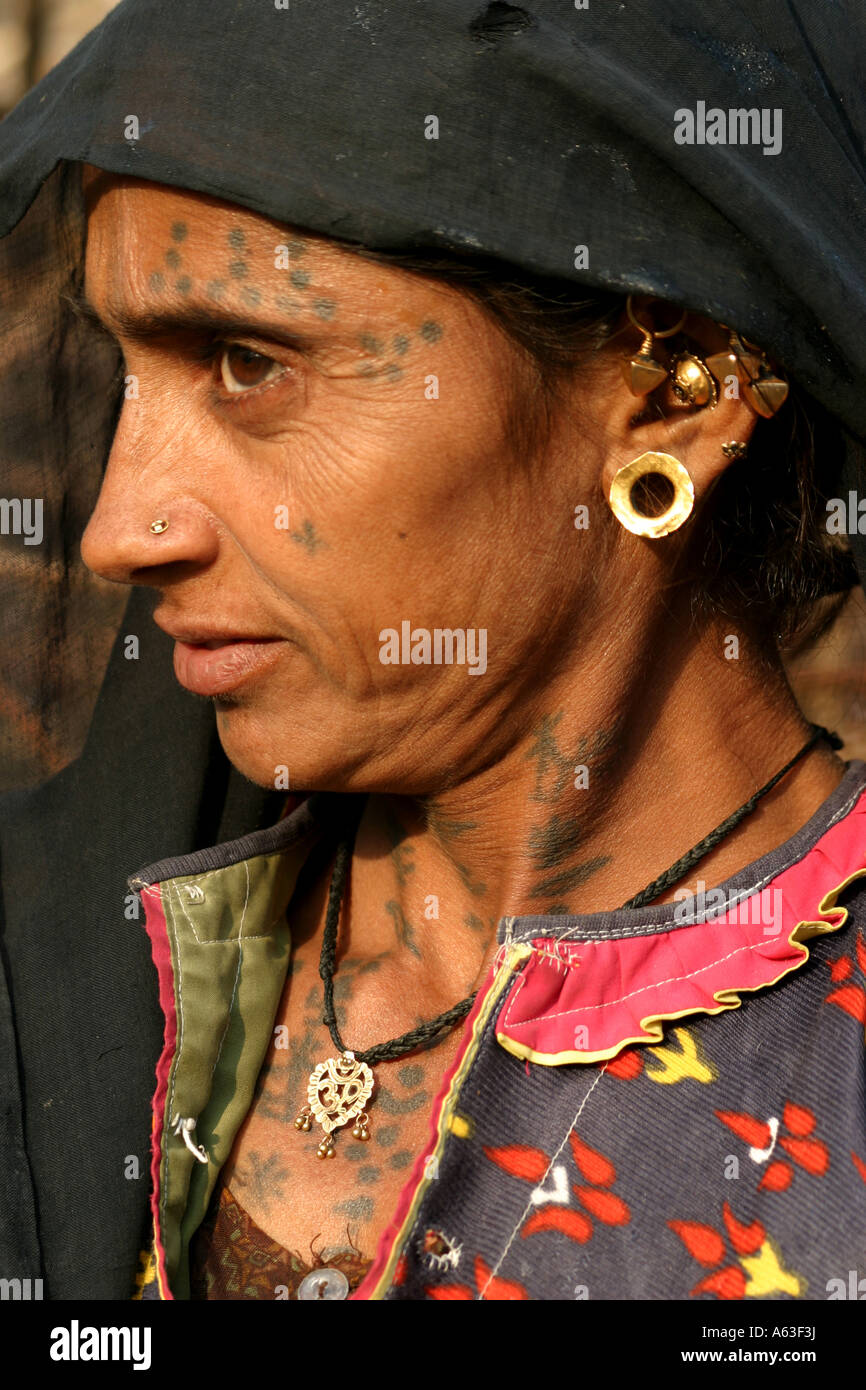 Vibrantly colourful tattoed woman of the Bharwad tribe at Ambala ...