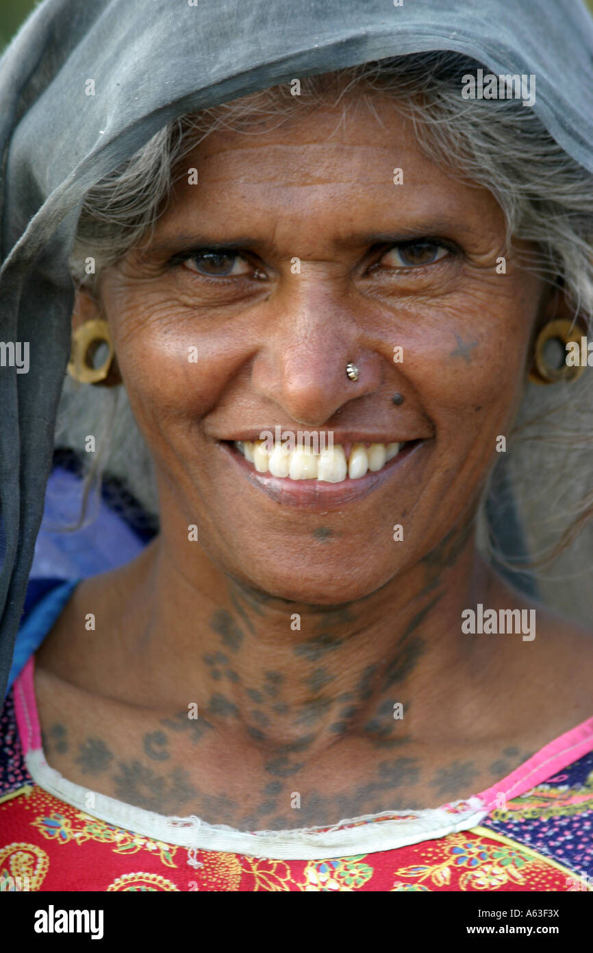 Vibrantly colourful tattoed woman of the Bharwad tribe at Ambala ...