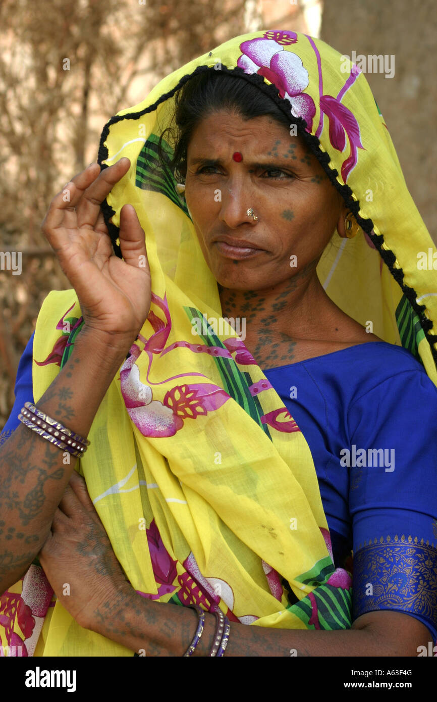 Vibrantly colourful tattoed woman of the Bharwad tribe at Ambala ...