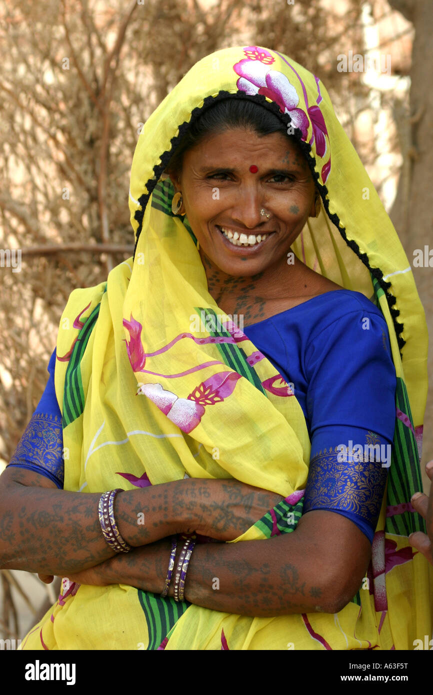 Vibrantly colourful tattoed woman of the Bharwad tribe at Ambala ...