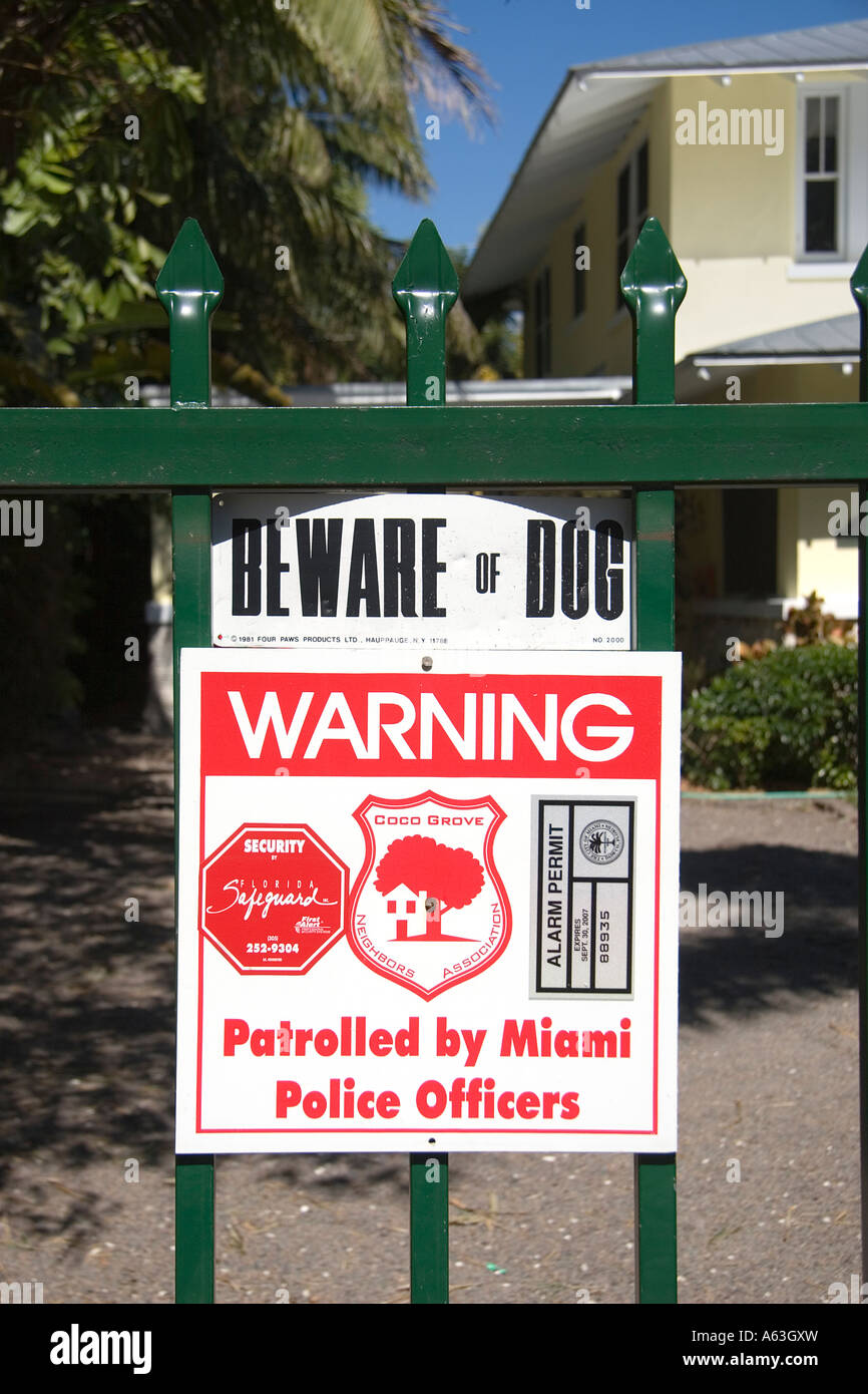 A sign on a gate in Coconut Grove Florida warning that the area is ...